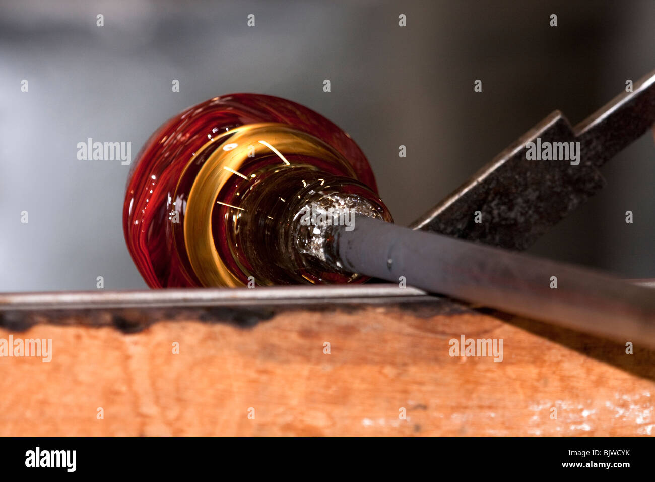 Glassblower molding glass Stock Photo - Alamy