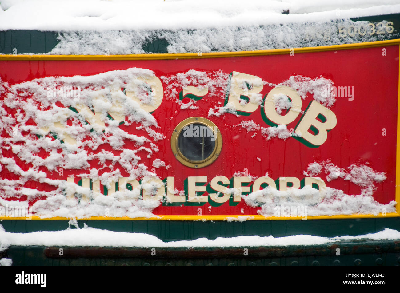 Snow on a narrowboat sign, Ashton canal, Ashton under Lyne, Tameside ...