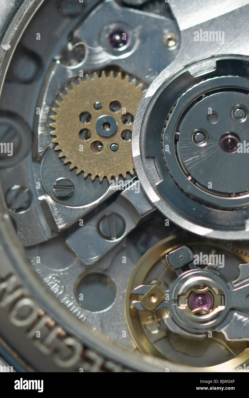 Closeup of the mechanism of a watch Stock Photo - Alamy
