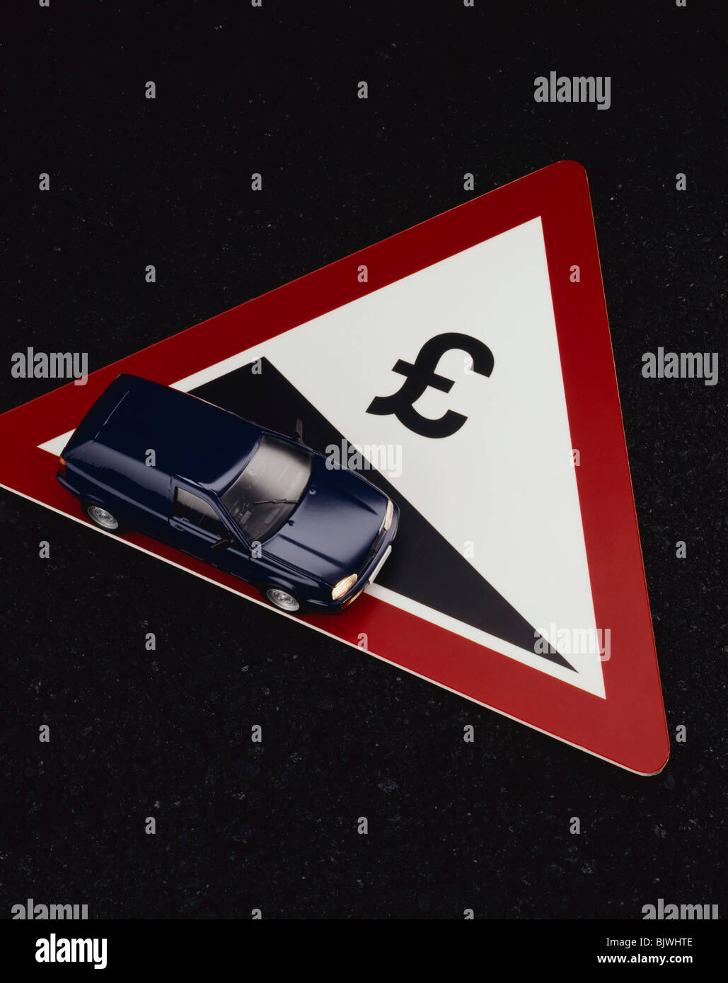 Model Van on Road Sign Stock Photo - Alamy