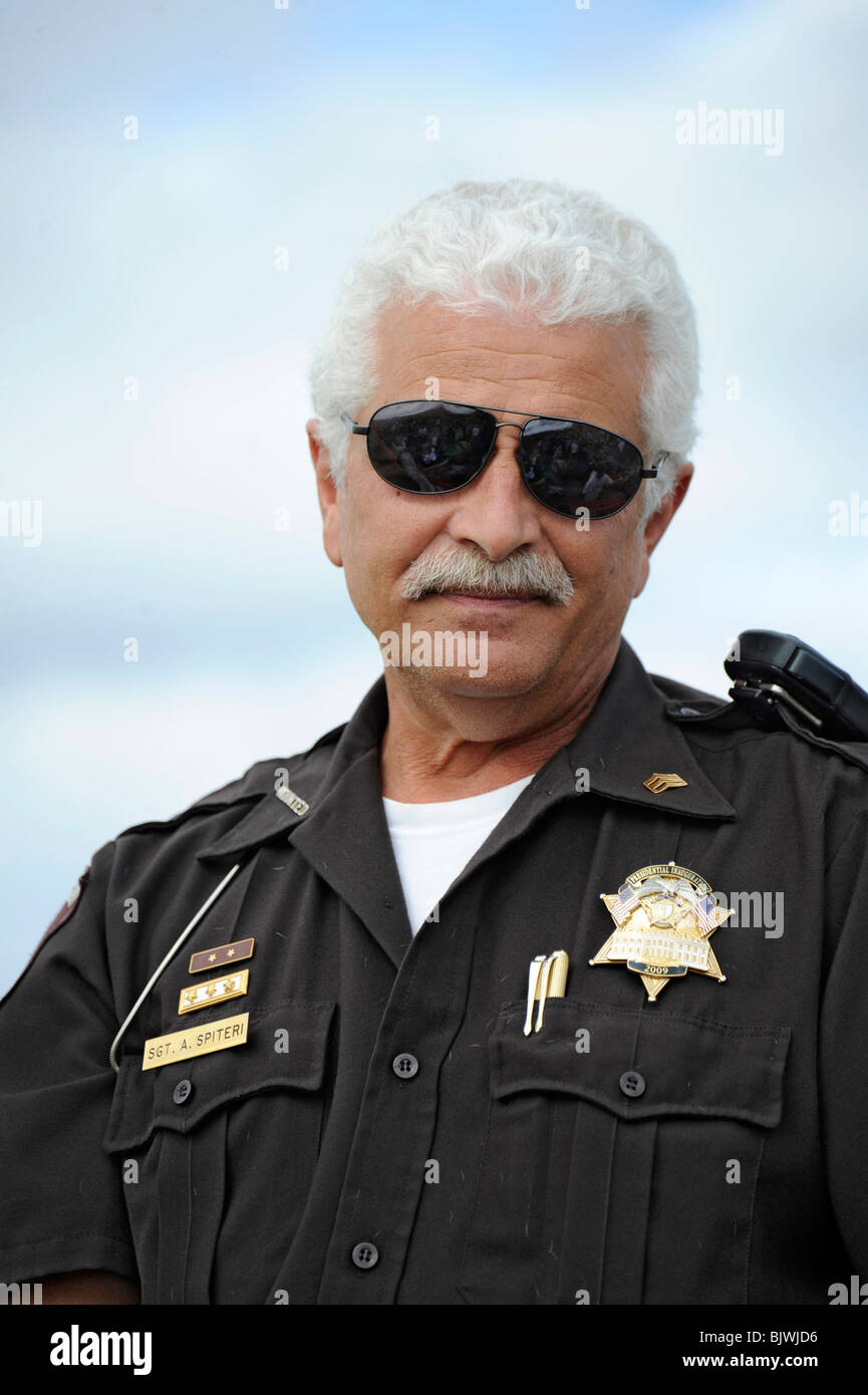 Police on guard for crowd control during a public event Stock Photo - Alamy