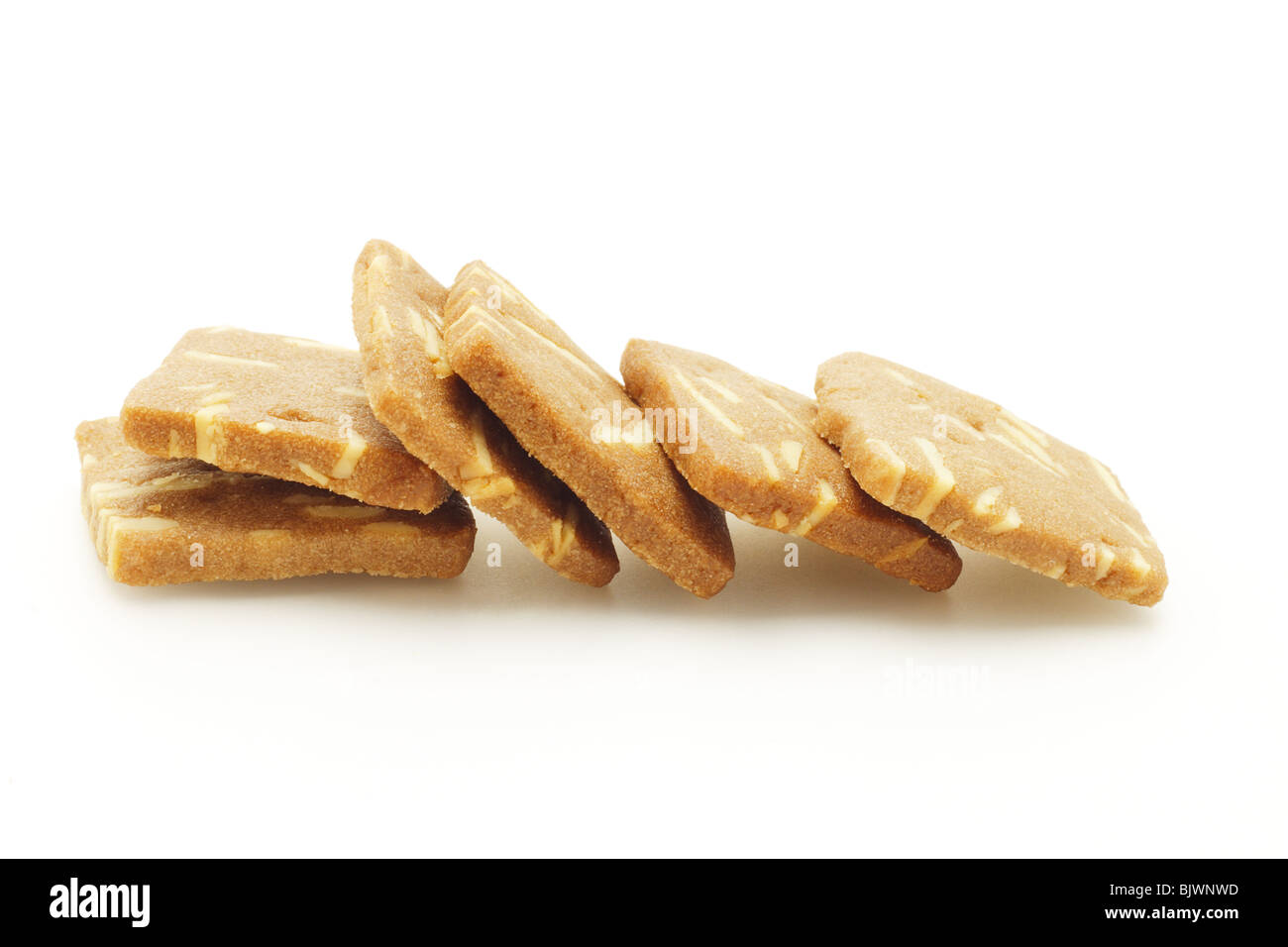Square shape almond chocolate cookies on white background Stock Photo ...