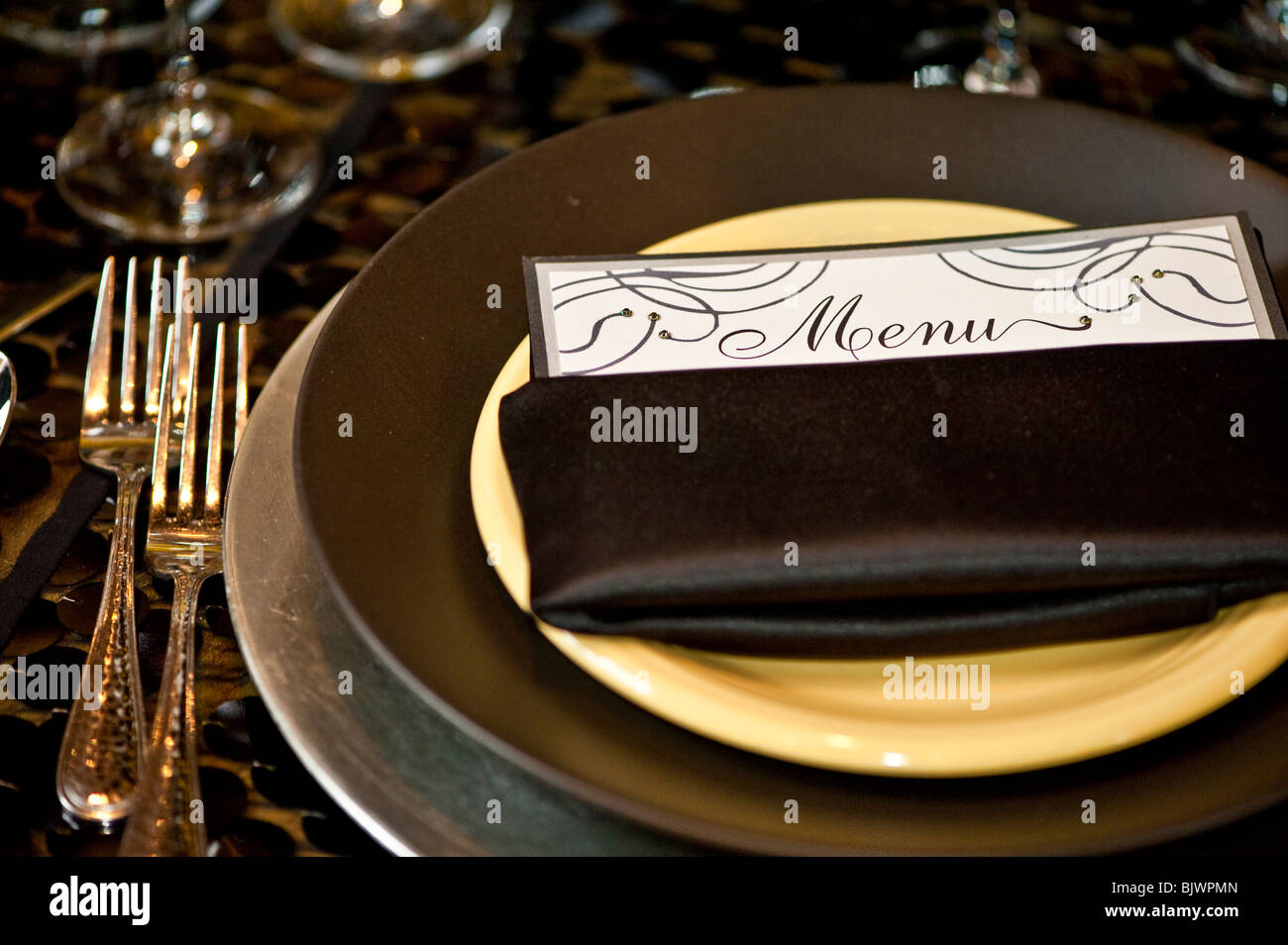 Beautifully decorated dinning set with a menu on the plate Stock Photo ...