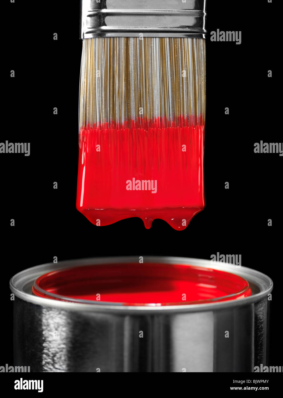 Paintbrush dipped in red paint isolated on black background Stock Photo ...