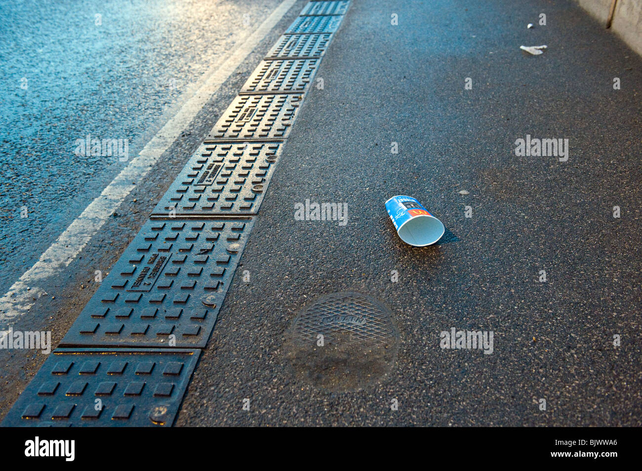 Rubbish on street Stock Photo - Alamy