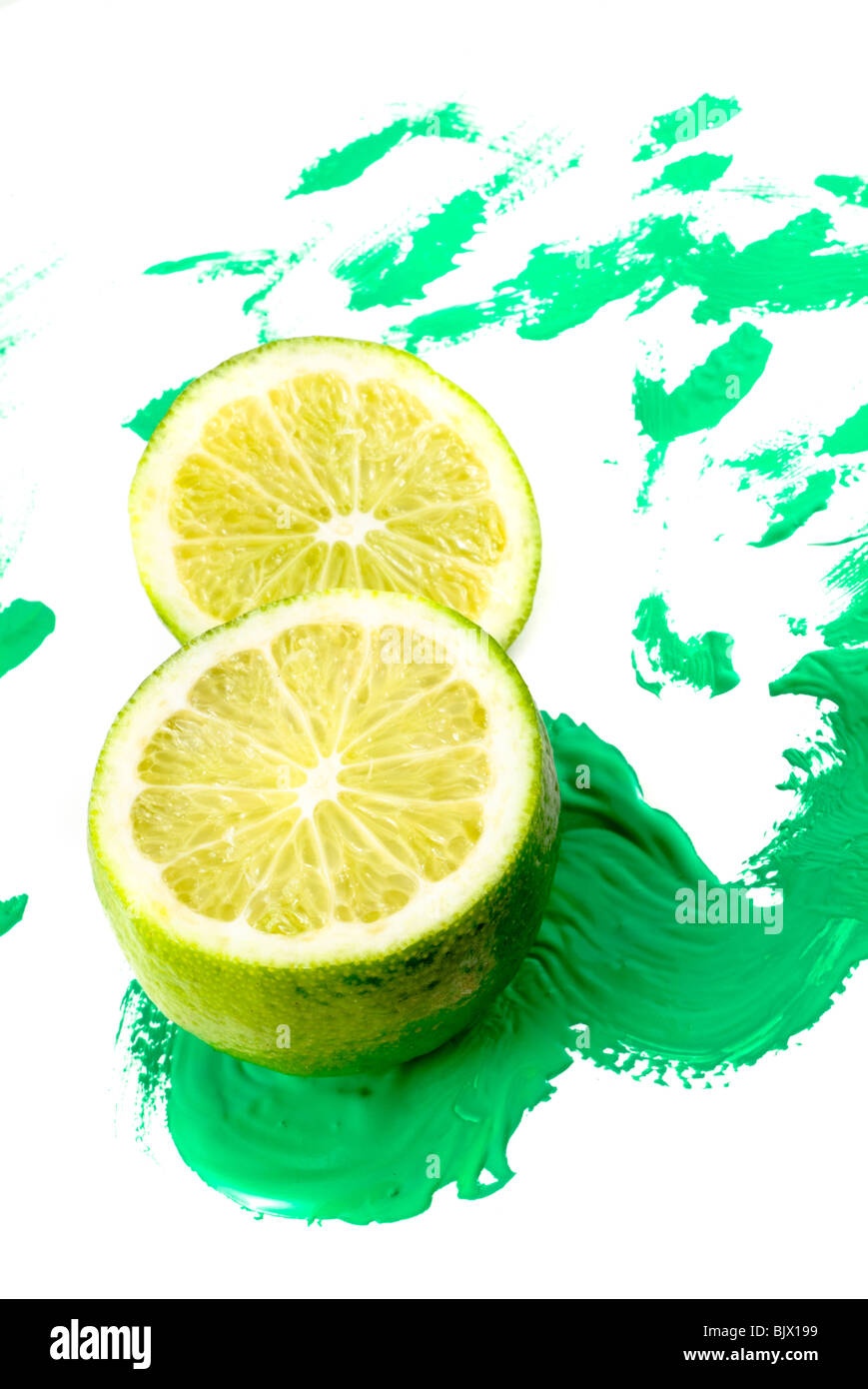 Orange and paints. Isolation on white Stock Photo - Alamy