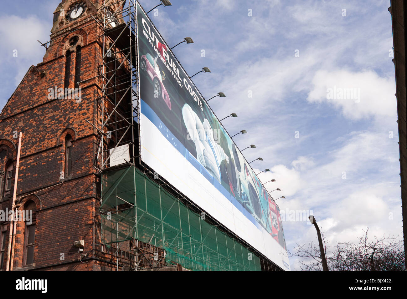 Advertising hoarding on the side of an old industrial building Stock ...