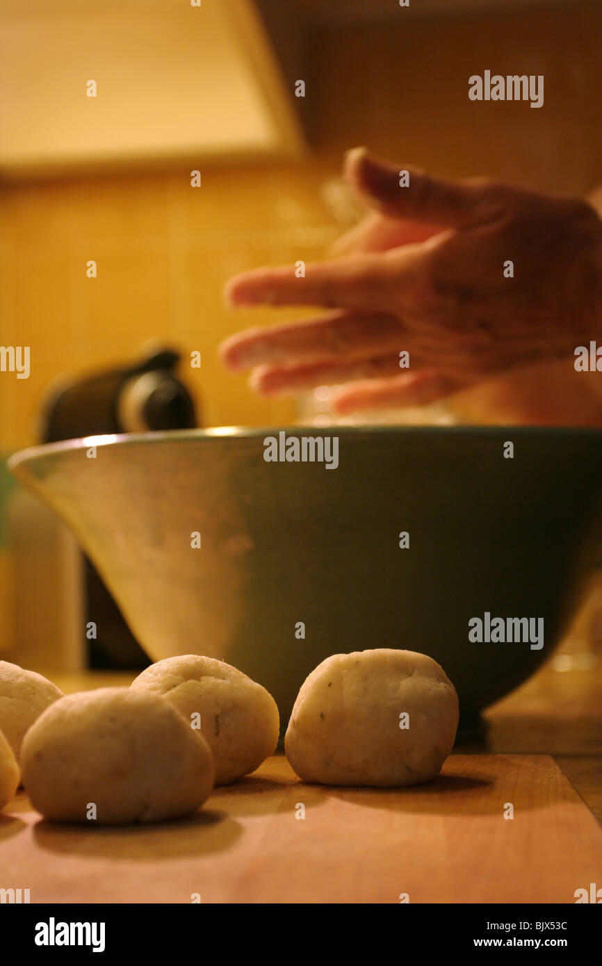 Knödel, German dumplings, are prepared before being boiled Stock Photo ...