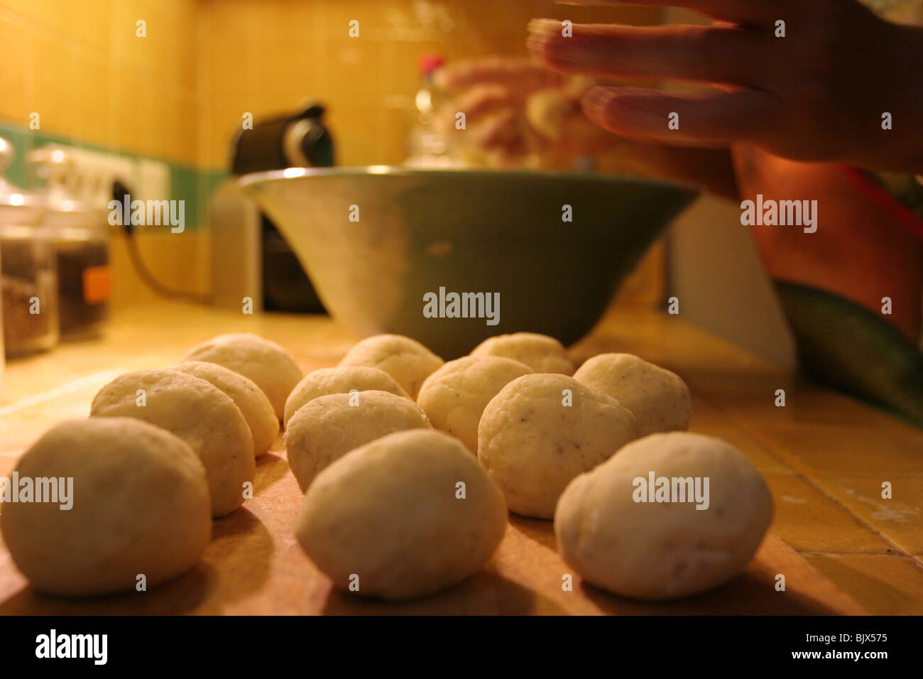 Knödel, German dumplings, are prepared before being boiled Stock Photo ...