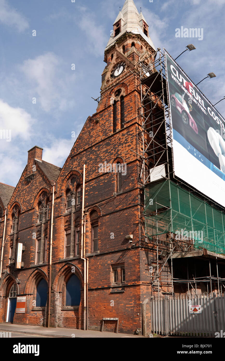 Old industrial buildings with an advertising hoarding on the side Stock ...