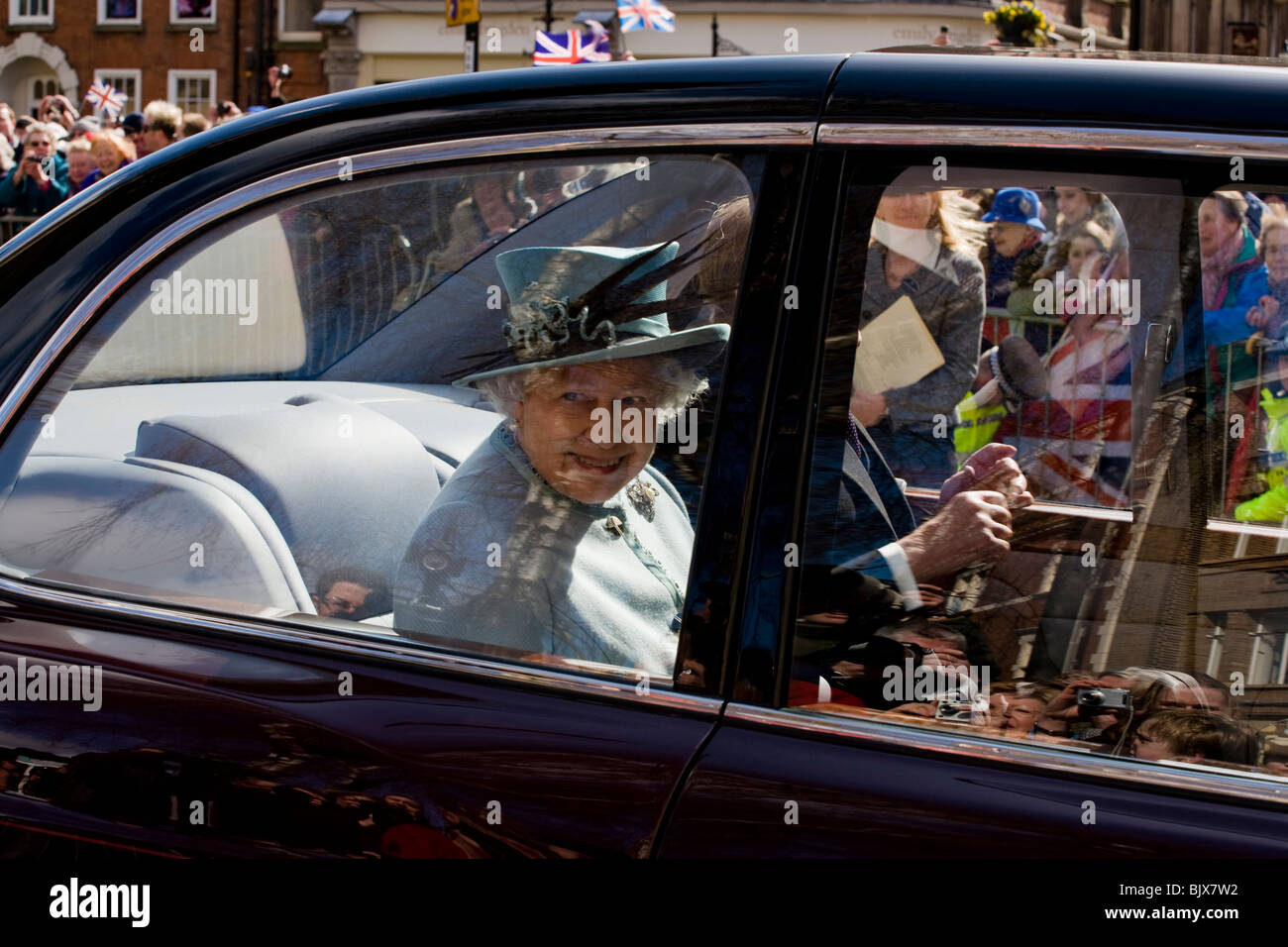 Her Majesty Queen Elizabeth II sat in the back of her Bentley State ...