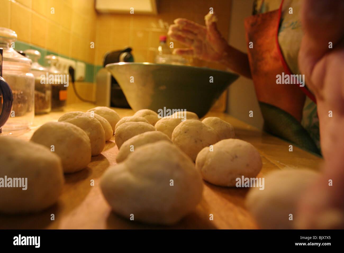 Knödel, German dumplings, are prepared before being boiled Stock Photo ...