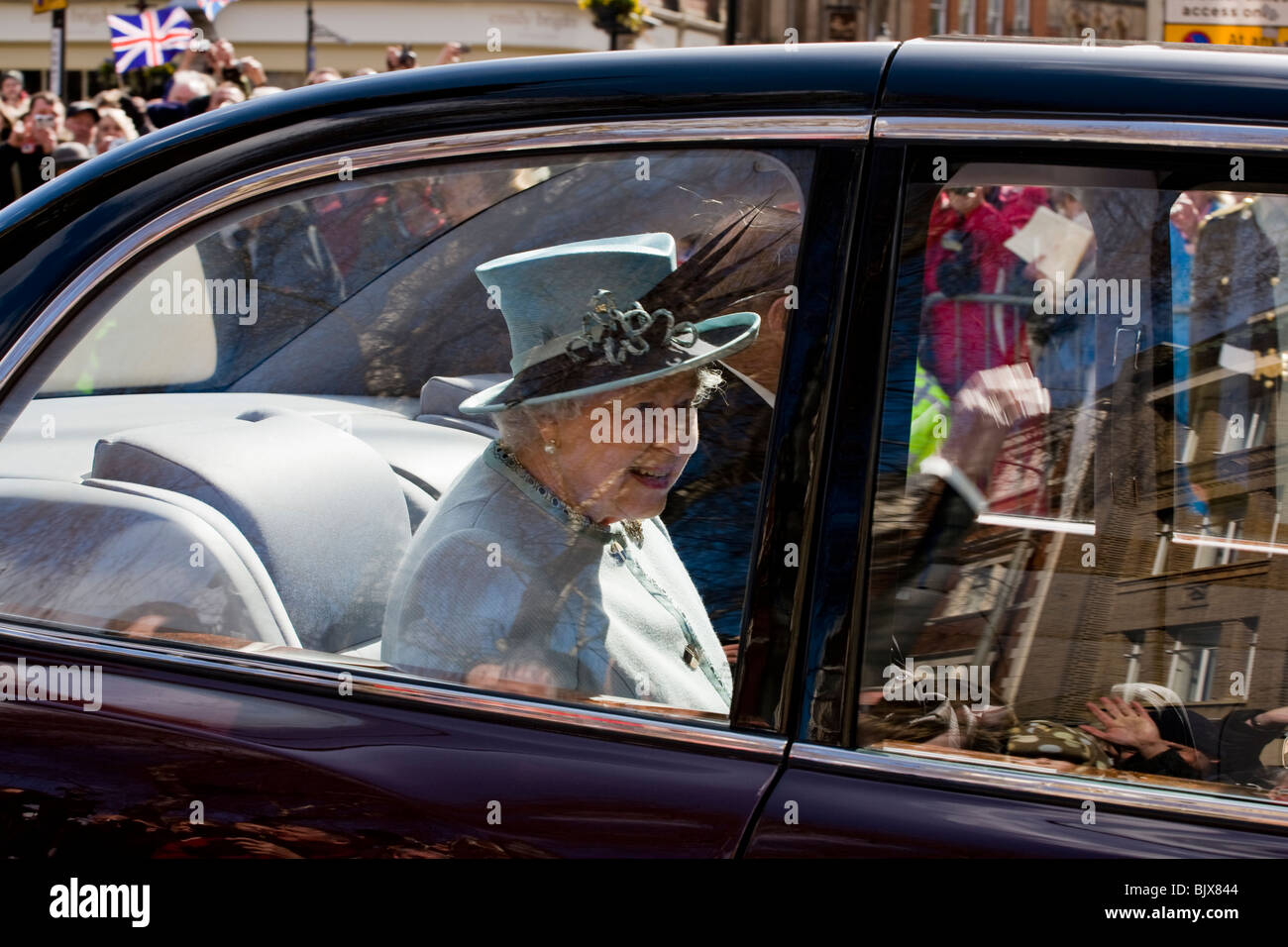 Her Majesty Queen Elizabeth II sat in the back of her Bentley State ...