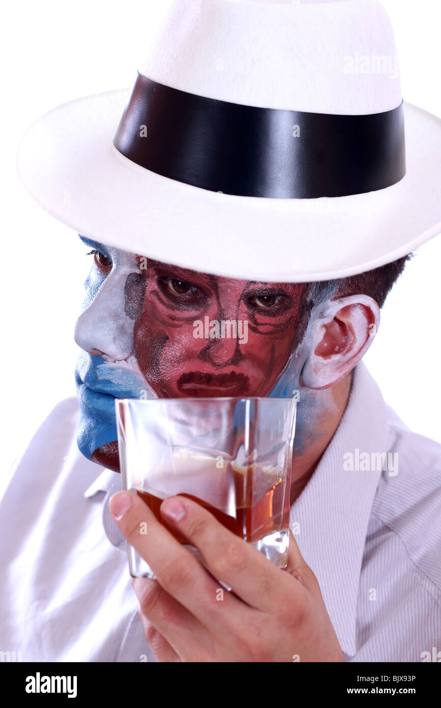 Portrait of drinking man with artistic makeup isolated on white ...