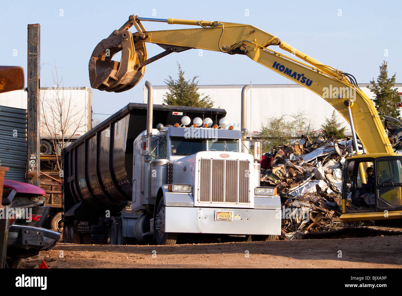 Loading a large truck lorry at a junkyard with scrap metal Stock Photo ...
