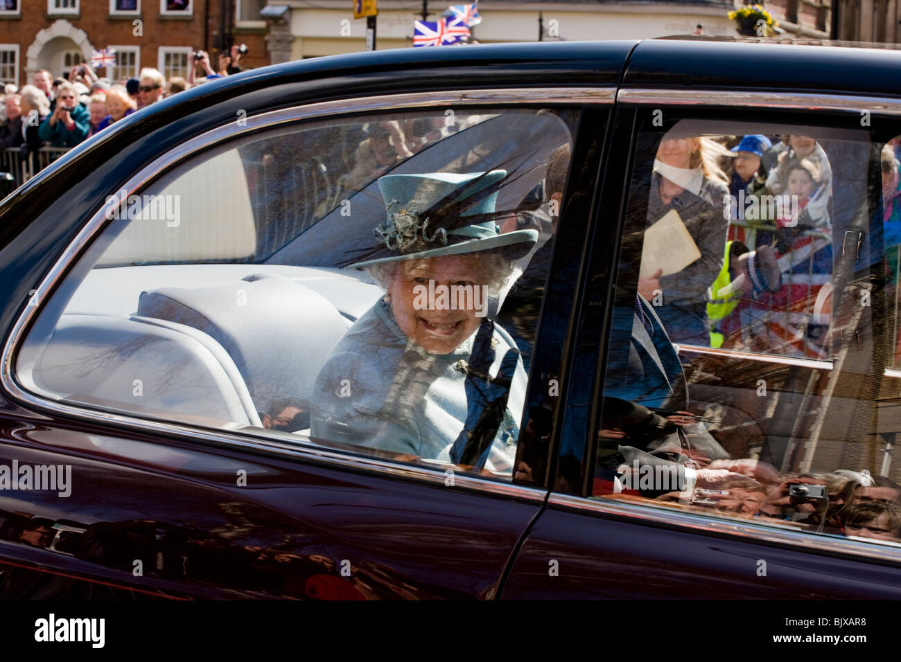 Her Majesty Queen Elizabeth II sat in the back of her Bentley State ...