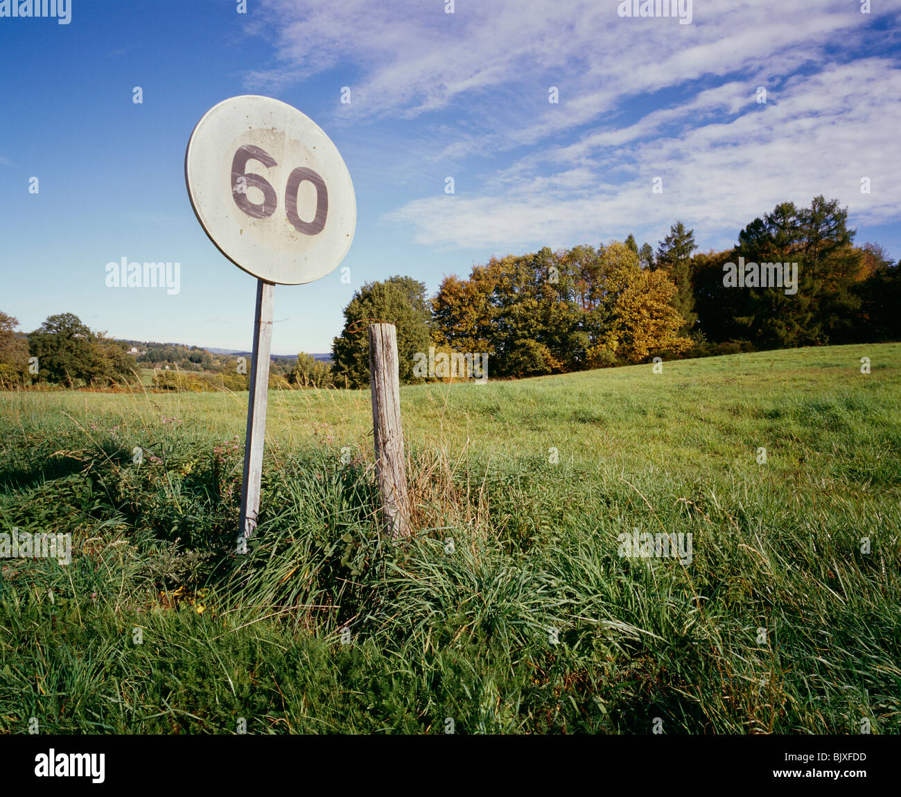 Road sign in field Stock Photo - Alamy