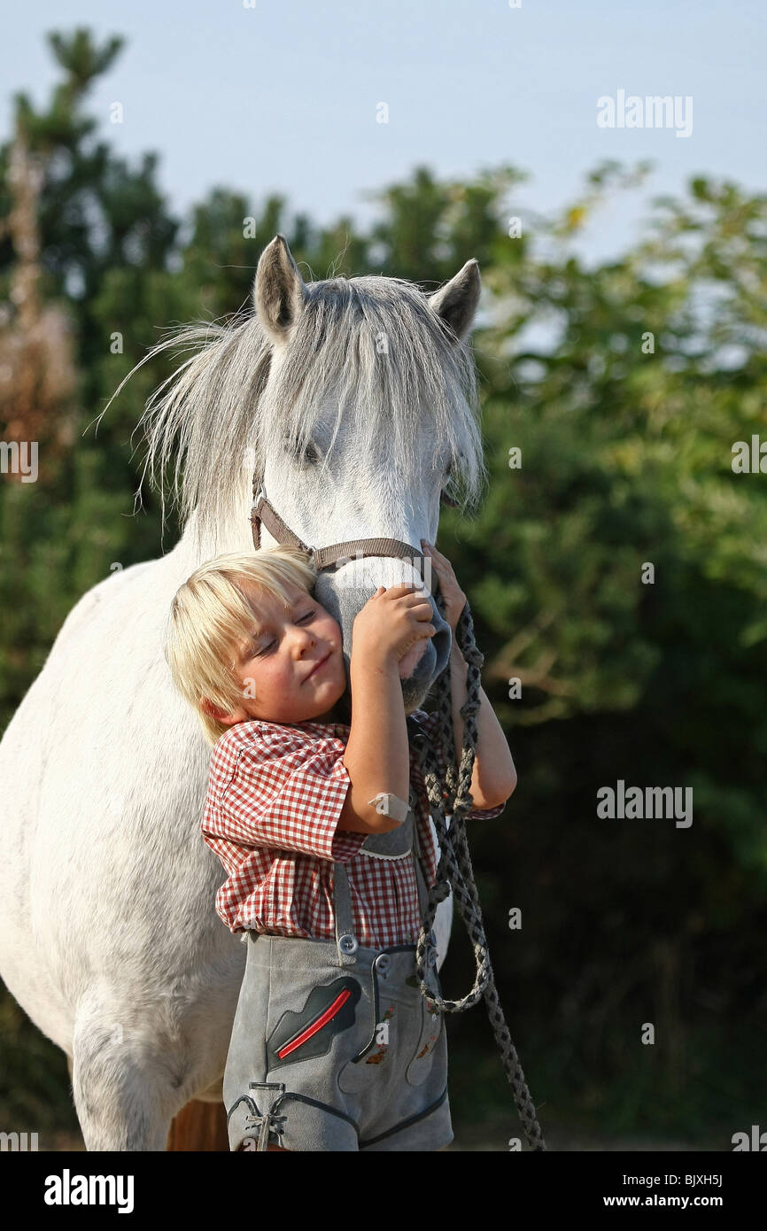 boy with pony Stock Photo - Alamy