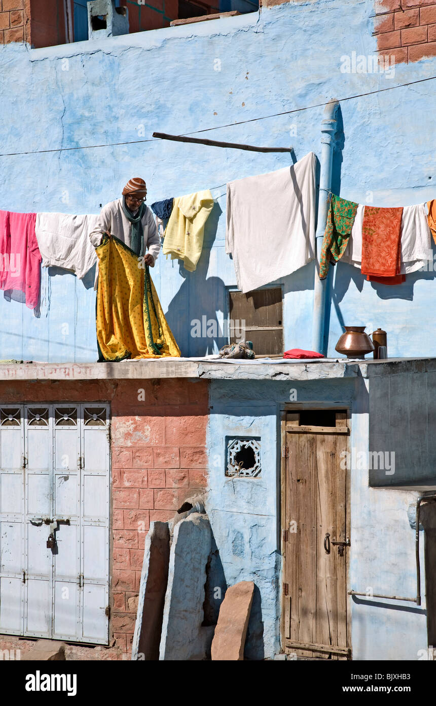 Old man drying clothes. Nagaur. Rajasthan. India Stock Photo - Alamy
