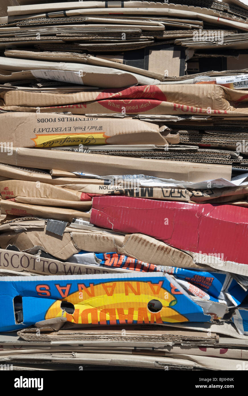 Stack of cardboard boxes compressed ready for recycling Stock Photo - Alamy