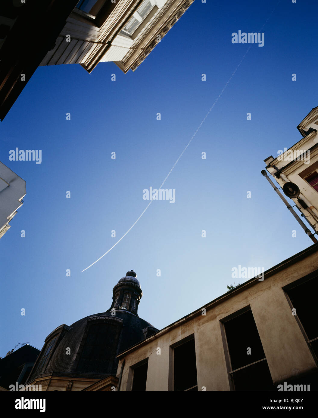 Airplane track in sky Stock Photo - Alamy