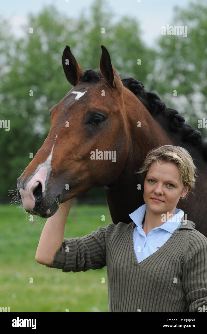 woman with Holsteiner horse Stock Photo - Alamy