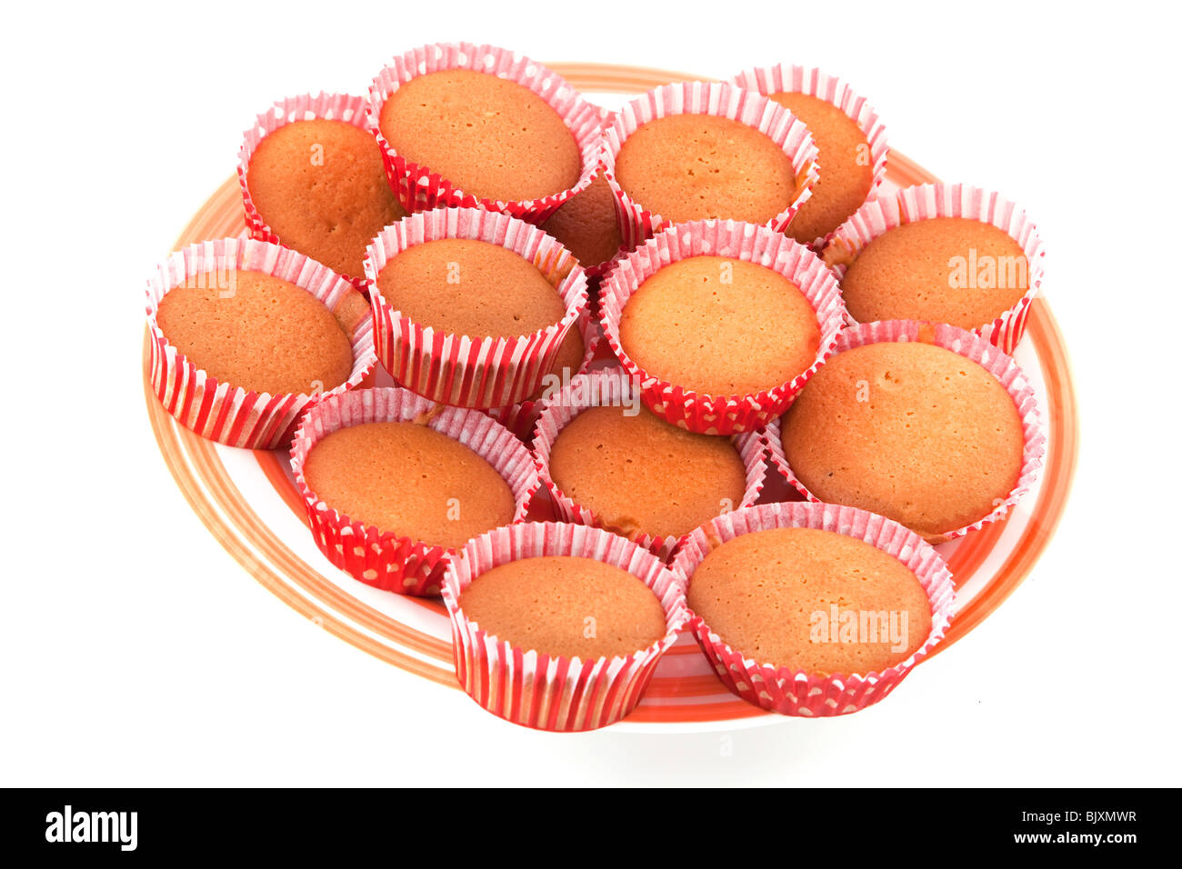 Many cupcakes in red on a big plate to serve Stock Photo - Alamy