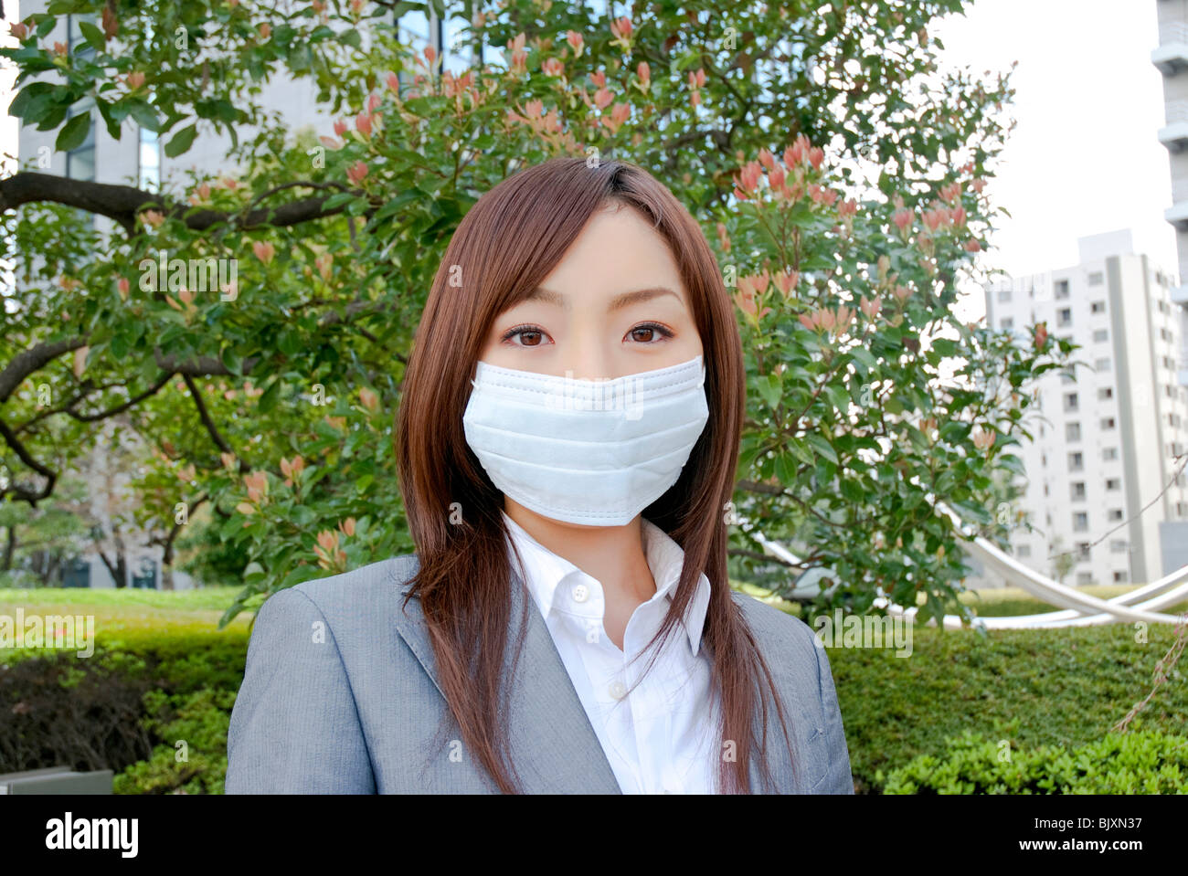 Young woman wearing mask Stock Photo - Alamy