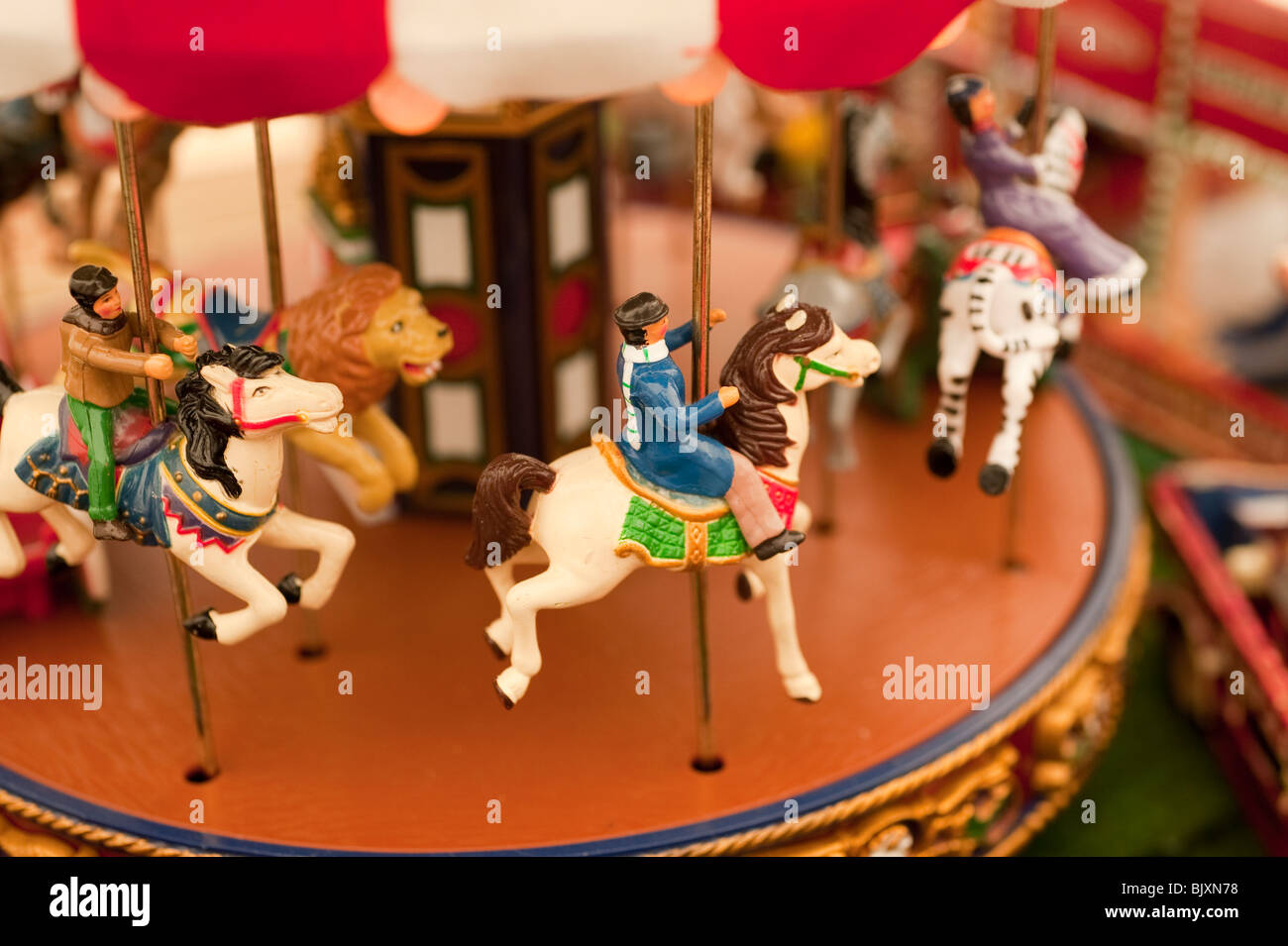 Model fairground merry go round ride Stock Photo - Alamy