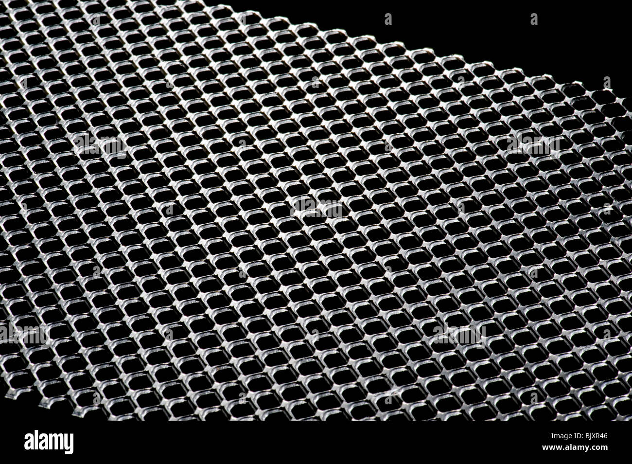 object on black - tool steel punched metal Stock Photo - Alamy