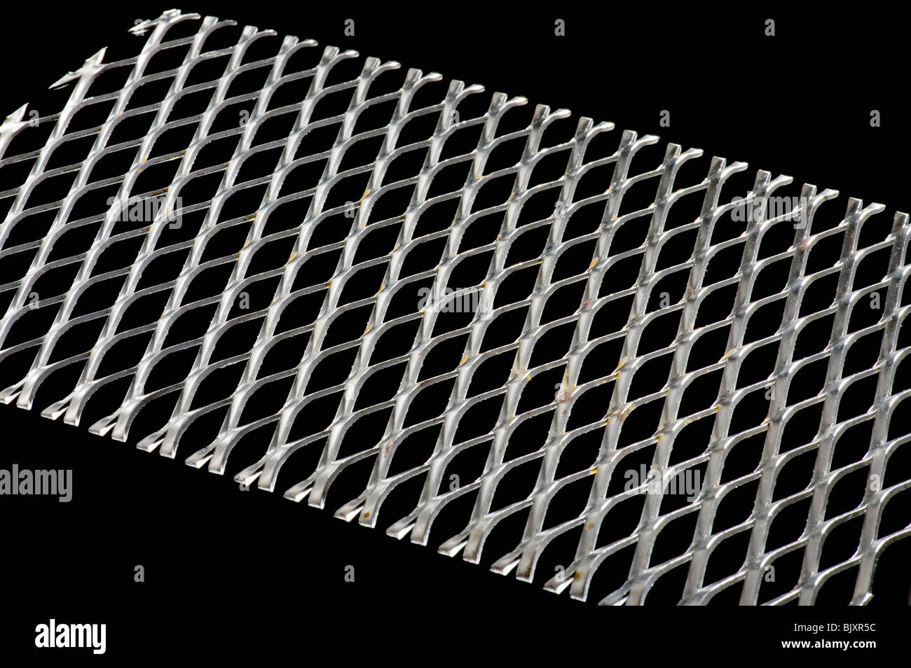 object on black - tool steel punched metal Stock Photo - Alamy