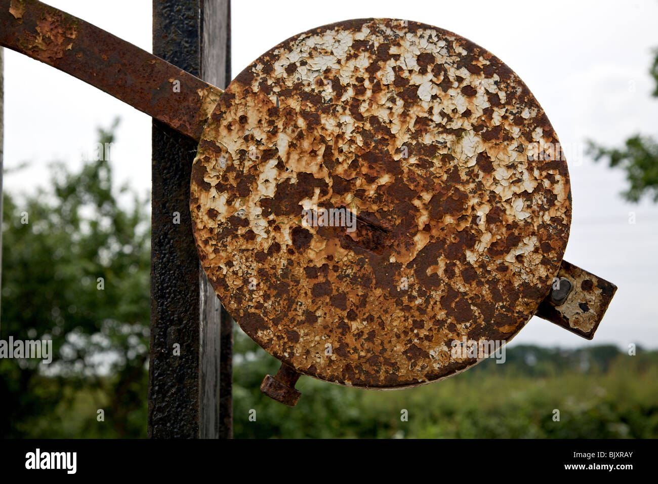 rusted arm and disc of rail signal at disused railway station HADLOW ...