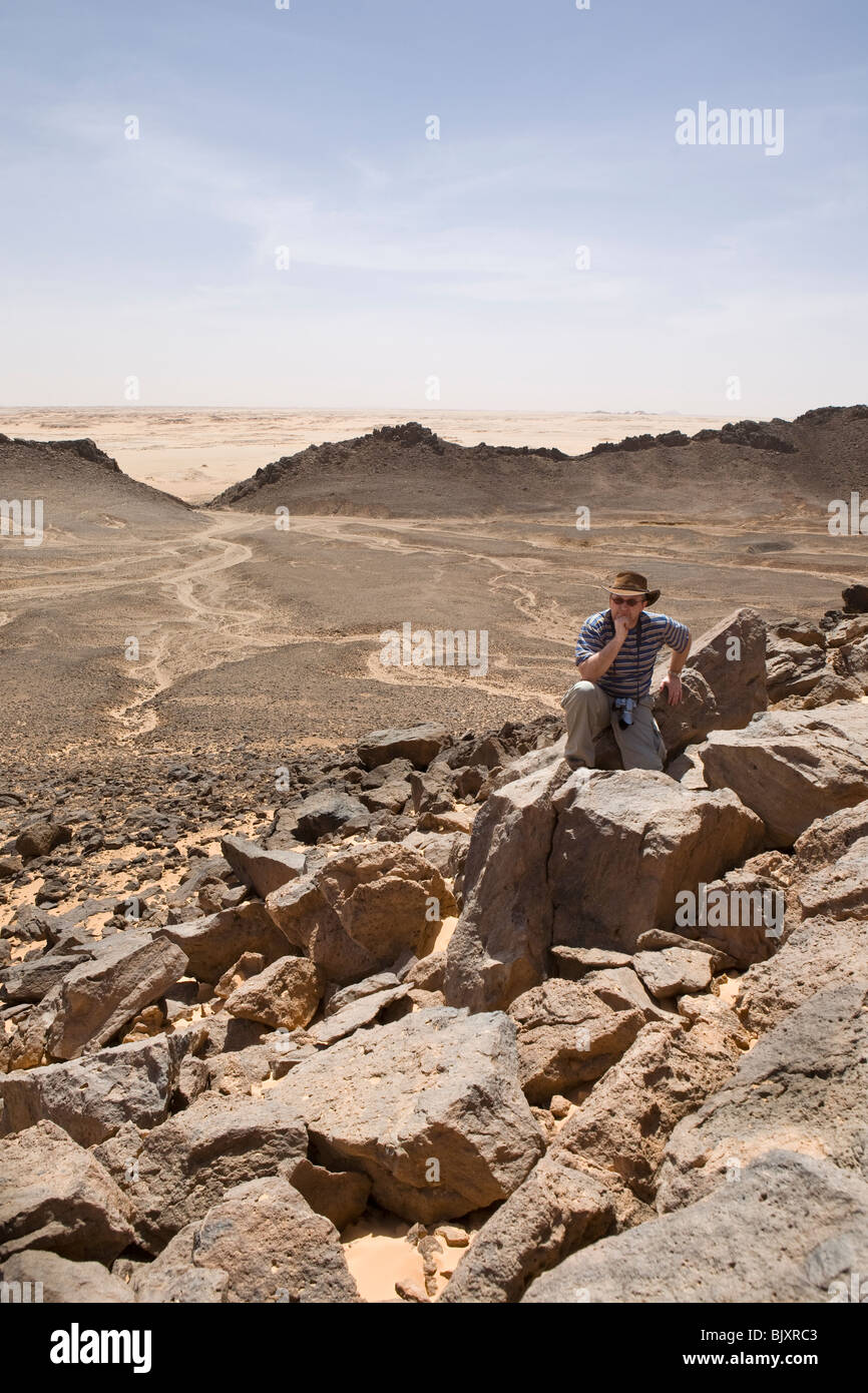 Geologist Colin Reader at the rim of one of the famous Clayton Craters ...