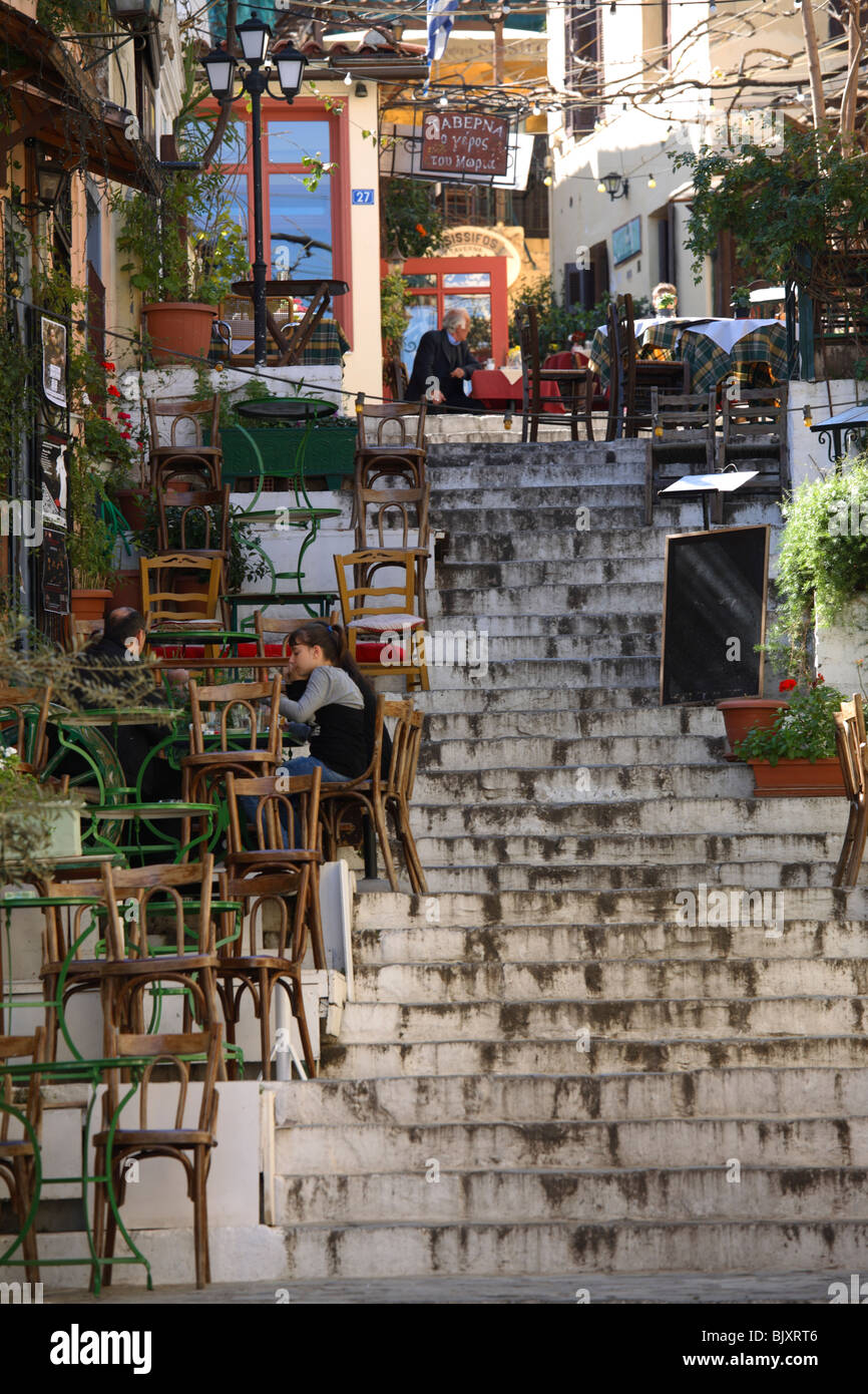 Traditional greek restaurant in the Plaka district, Athens, Greece ...