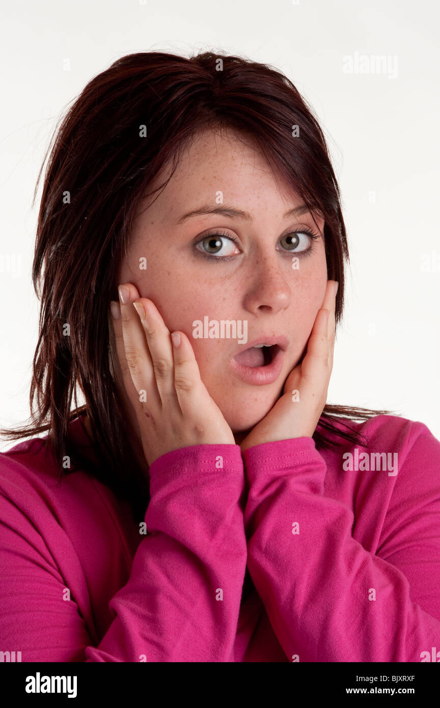 teenage girl with scared frightened facial expression Stock Photo - Alamy