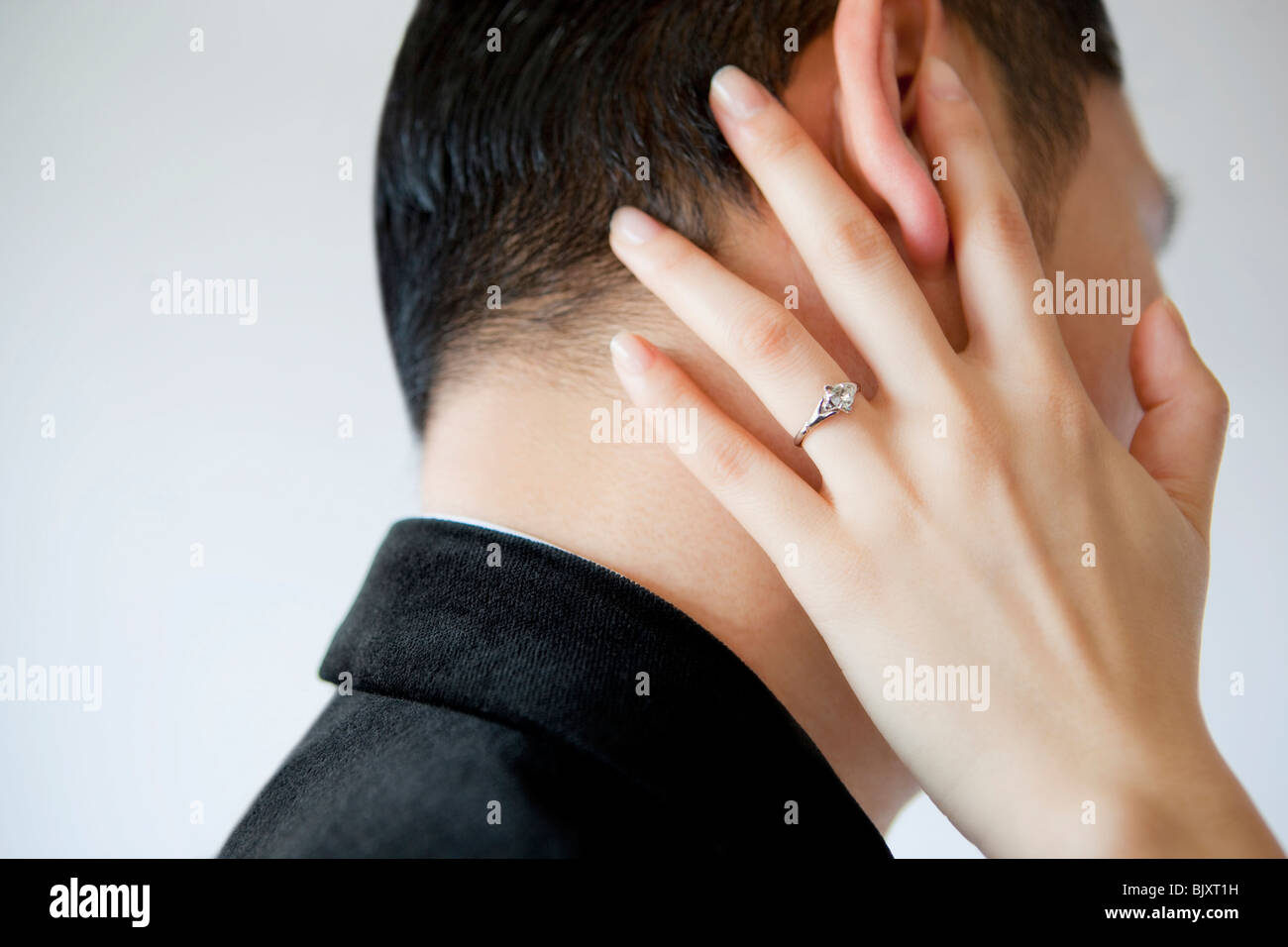 Woman touching man's face hi-res stock photography and images - Alamy