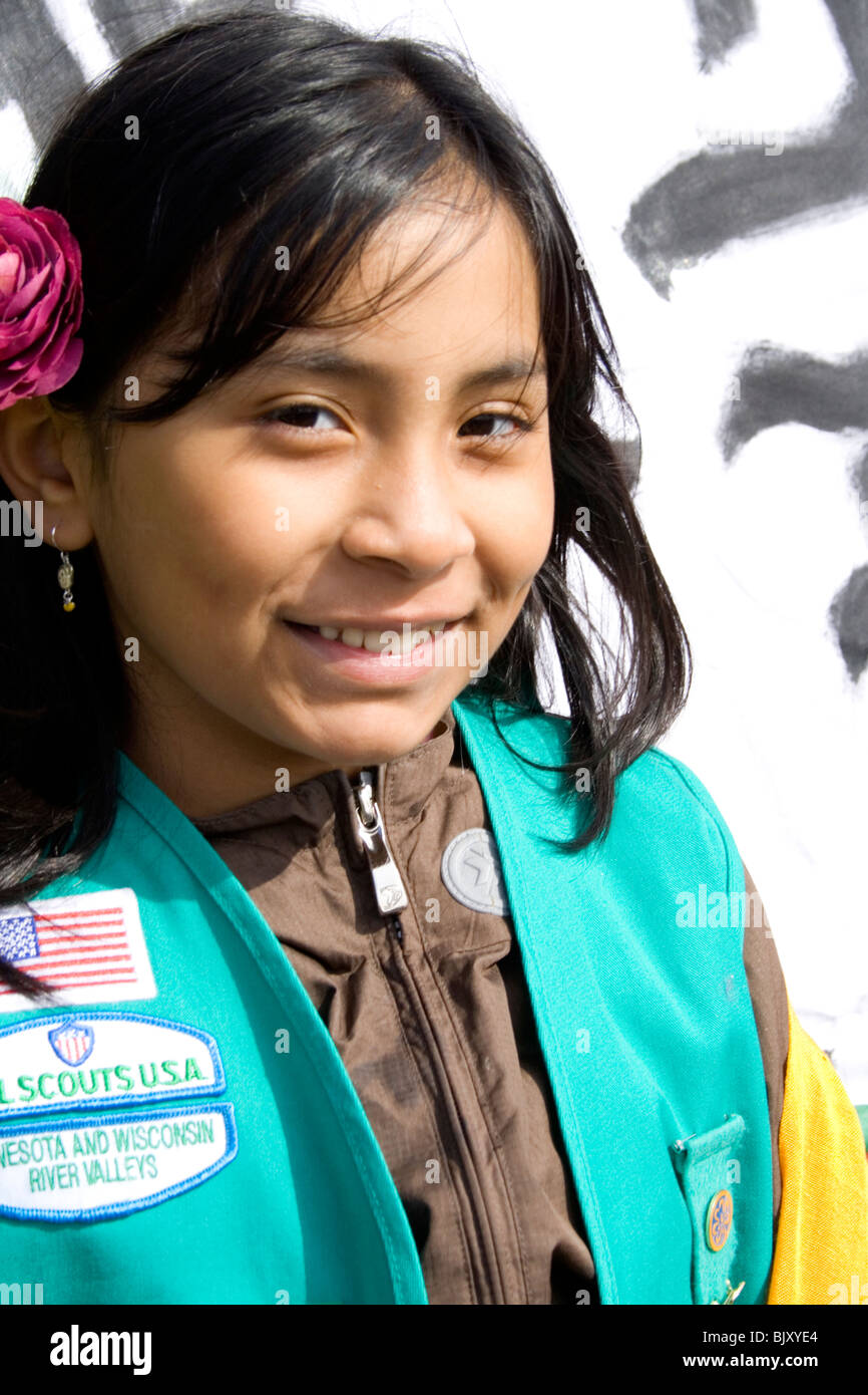Hispanic Girl Scout age 13 marching in parade. Cinco de Mayo Fiesta St ...
