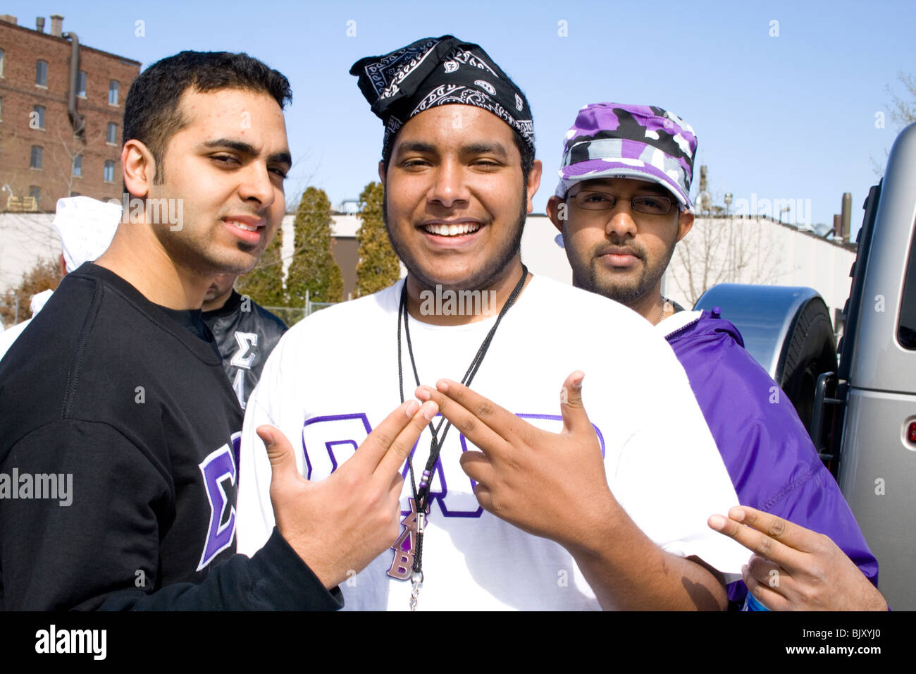 Happy Sigma Lambda Beta Latino fraternity brothers enjoying the ...