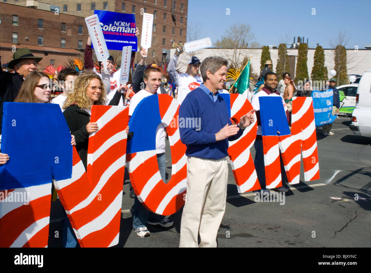 Minnesota Senator Norm Coleman marching with his political unit in the ...