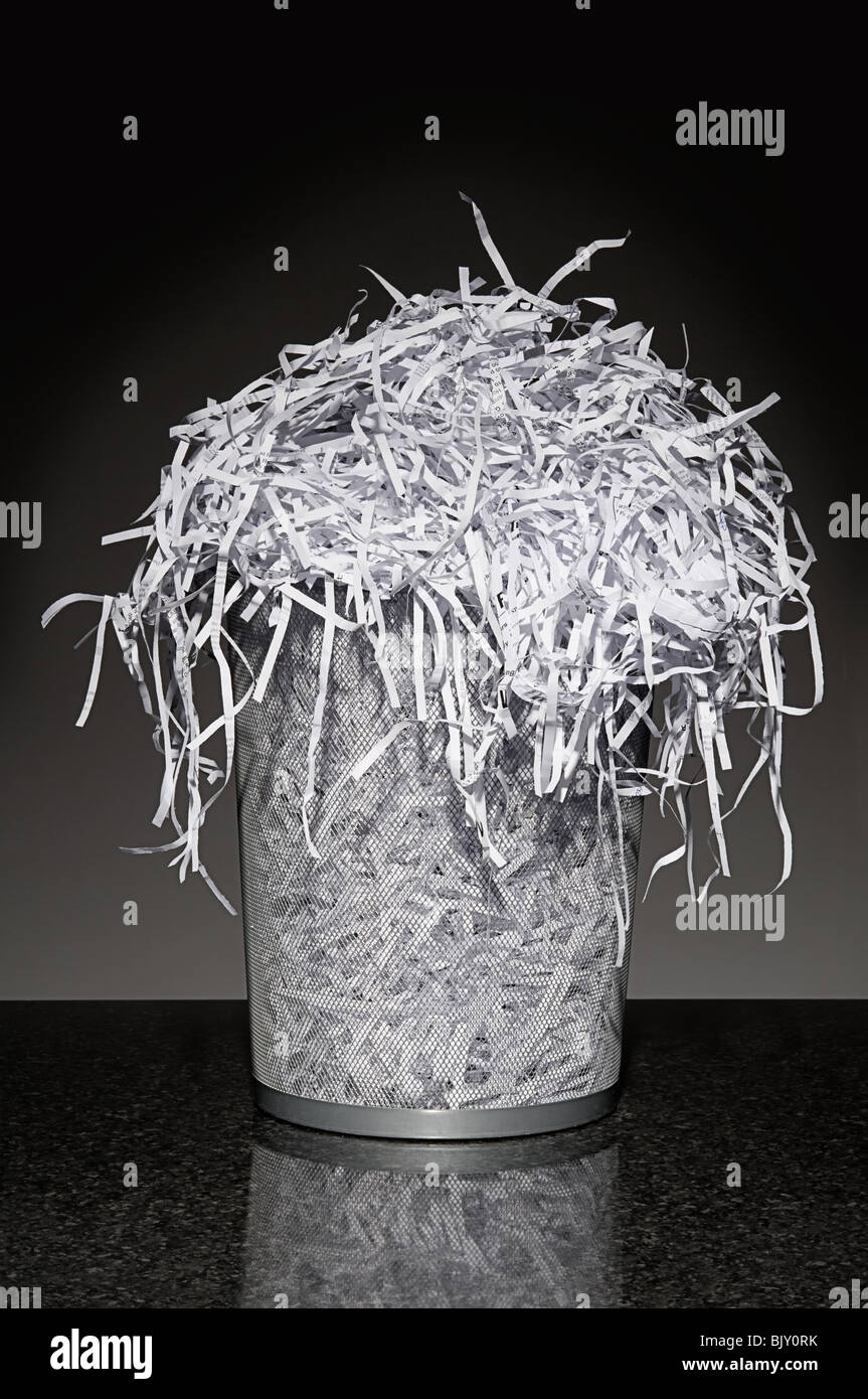 Shredded documents waste paper inside thin transparent plastic bag ...