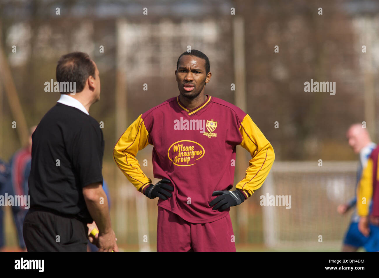 referee gives a warning to a football player Stock Photo - Alamy