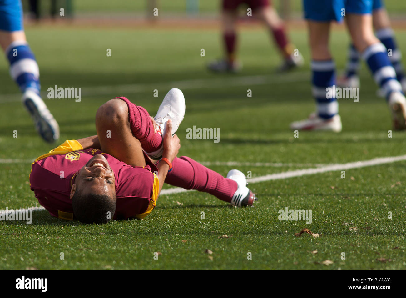 Injured pain agony football hi-res stock photography and images - Alamy