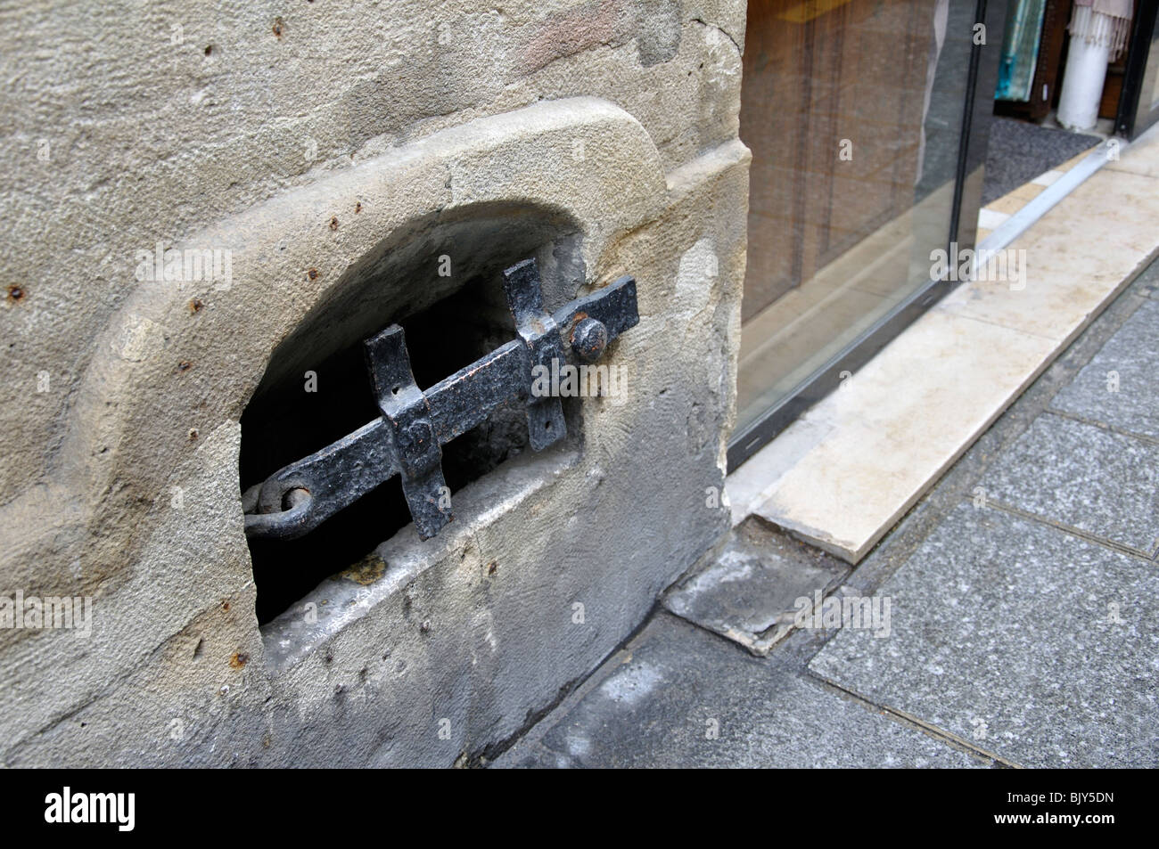 Little window in building foundation, Paris, France Stock Photo - Alamy