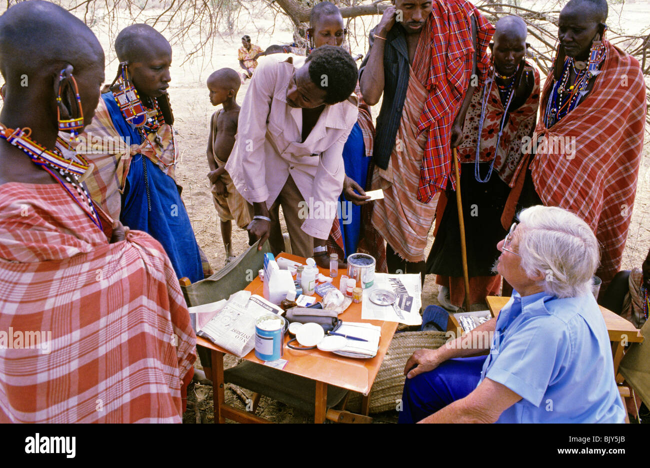 Dr Anne Spoerry holding a clinic with Maasai patients Stock Photo - Alamy