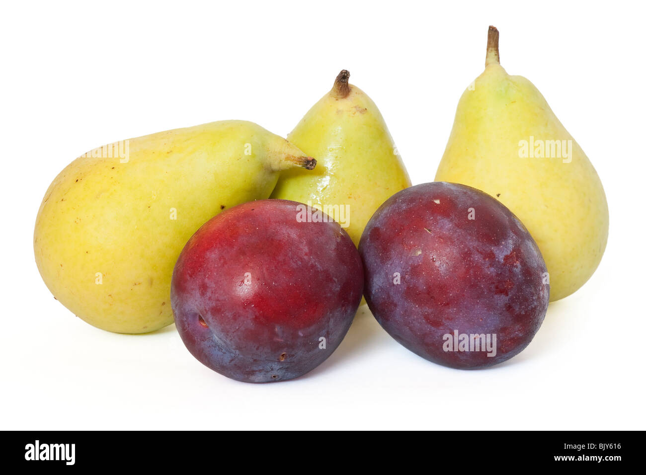 three pears and two plums isolated on white background Stock Photo - Alamy