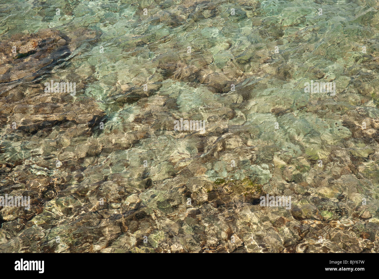 Clear water ripples and stones, suitable as nature background Stock ...