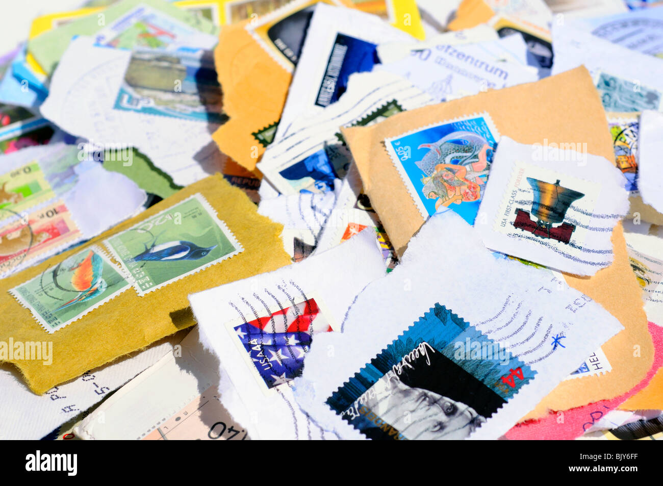 Assortment of used postage stamps Stock Photo - Alamy