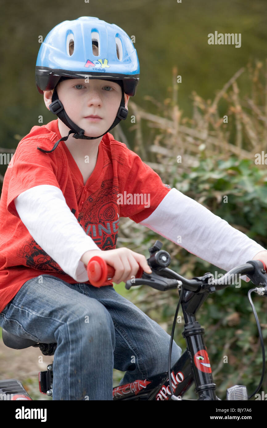Boy riding a bike Stock Photo - Alamy
