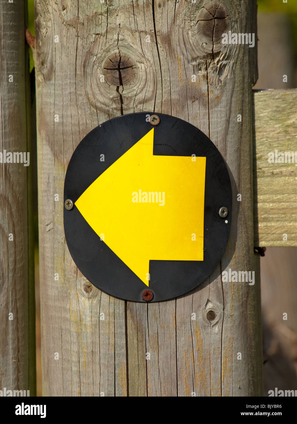 Public Footpath Yellow Arrow Marker Sign on Gatepost Stock Photo - Alamy