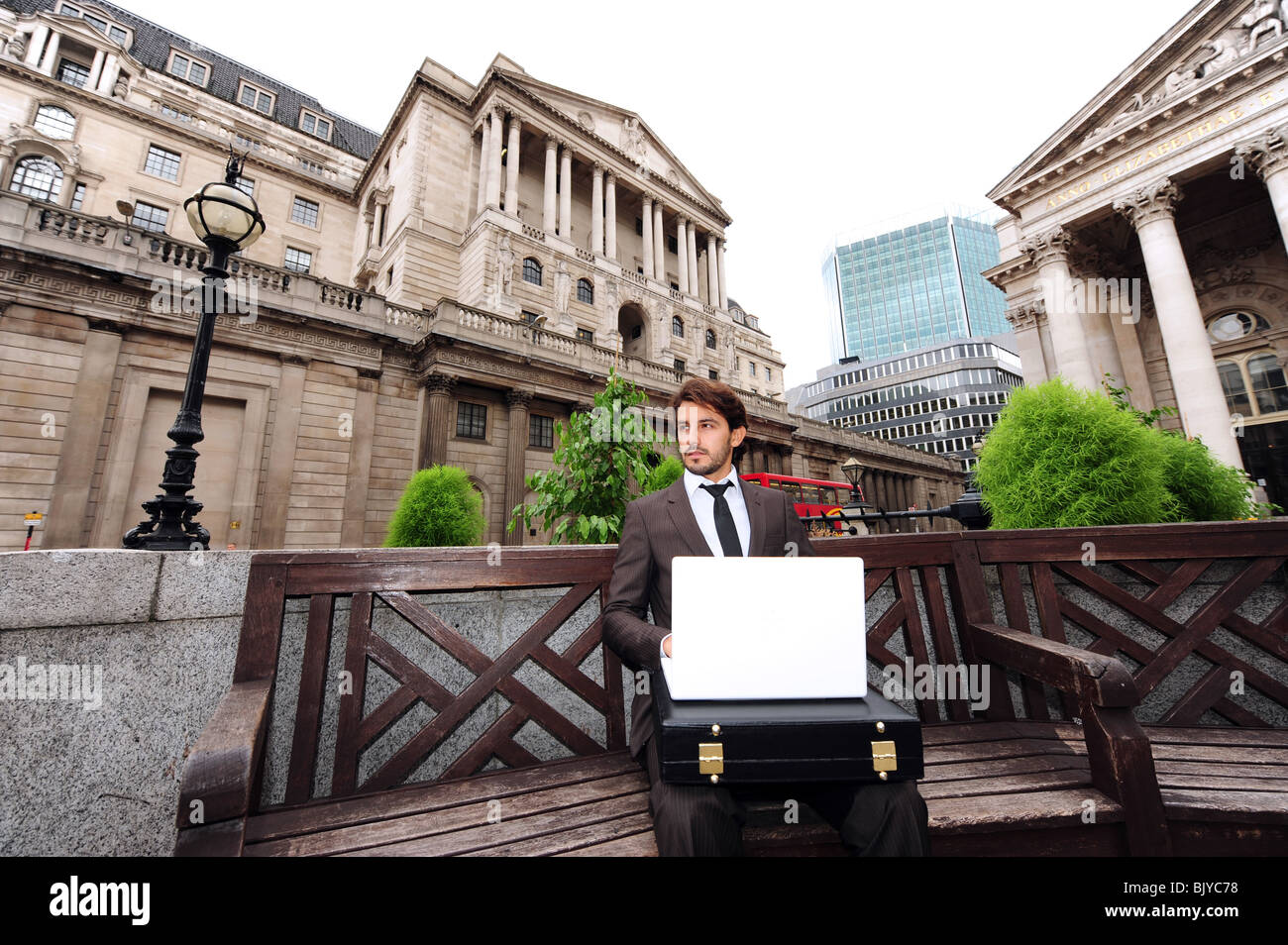 Man sitting outside bank building hi-res stock photography and images ...